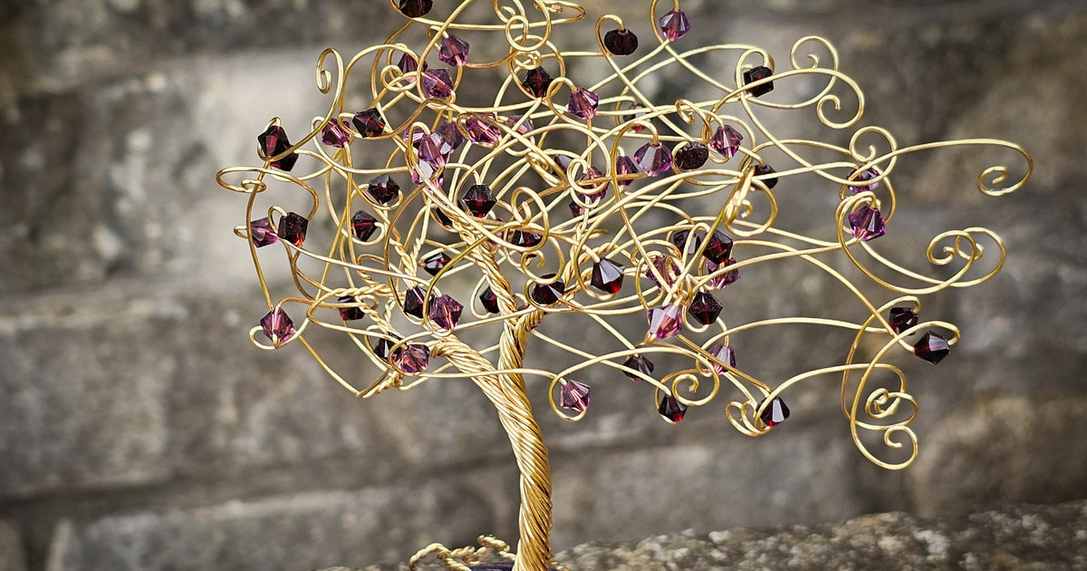 memorialtreewithash-2.jpg?crop=center&height=630&v=1713467298&width=1200