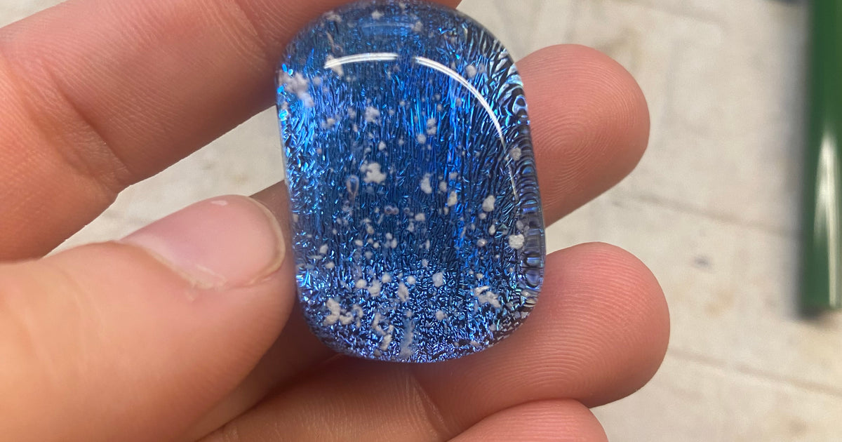 blueinhand.jpg?crop=center&height=630&v=1677518628&width=1200